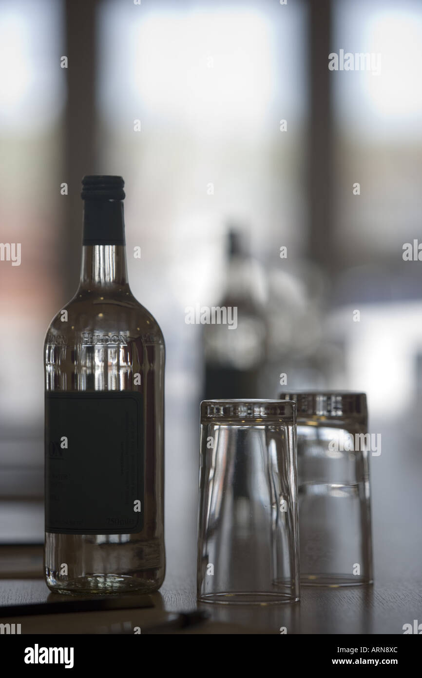 Water bottle and glasses set up for a meeting Stock Photo - Alamy