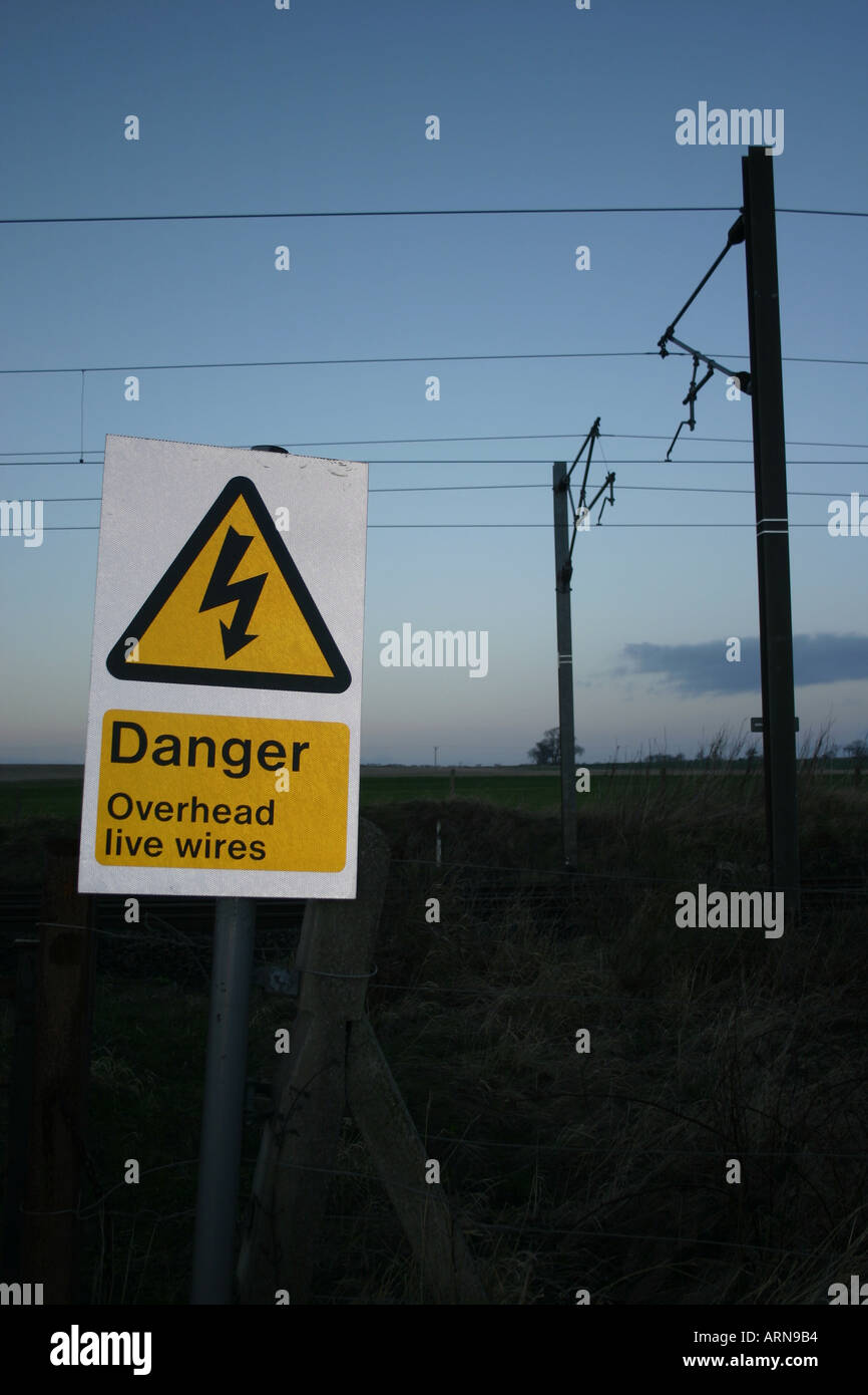 Danger Overhead Live Wires warning sign at Alnmouth Northumberland ...