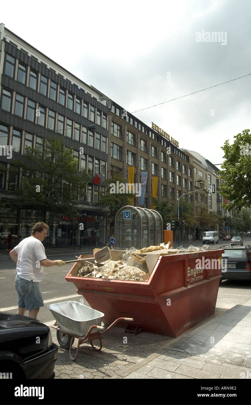 Man skip street hi-res stock photography and images - Alamy