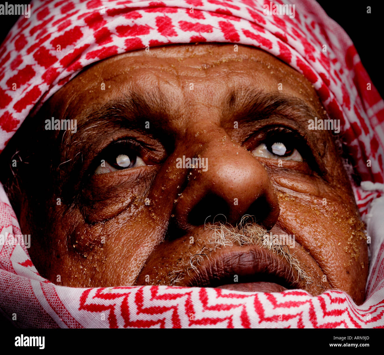 Arab looking upwards into the future Stock Photo - Alamy