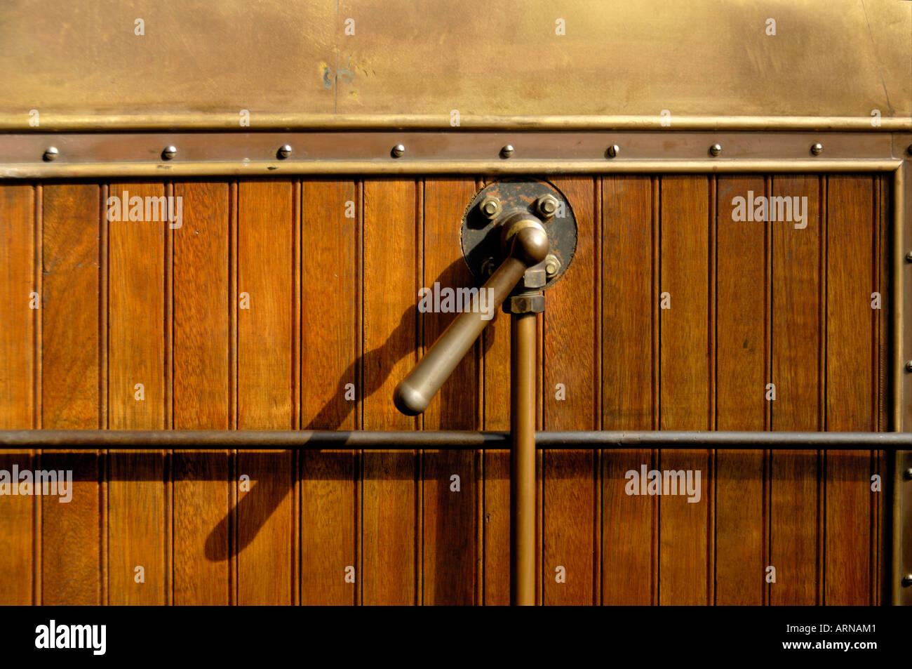 Copper pipe and lever on steam engine Stock Photo - Alamy