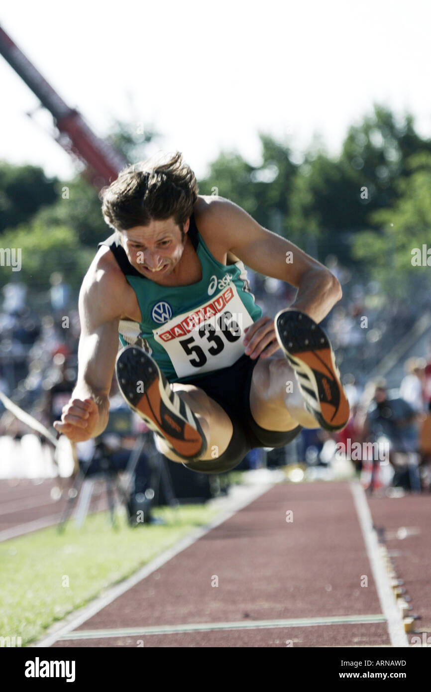 Long jump men hi-res stock photography and images - Alamy