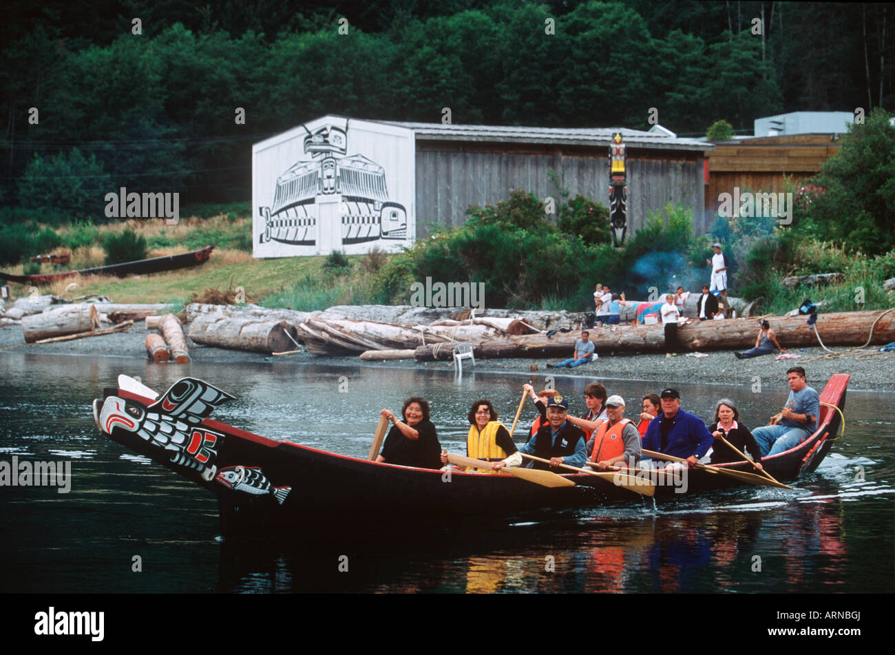 Alert Bay, U'mista Cultural Center visitors paddle traditional canoe ...