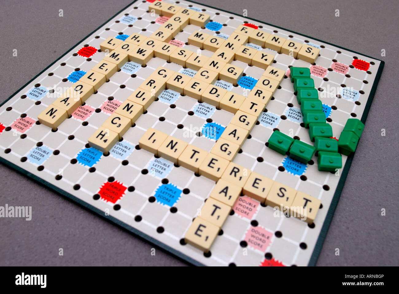 generic scrabble board with credit crunch wording Stock Photo - Alamy