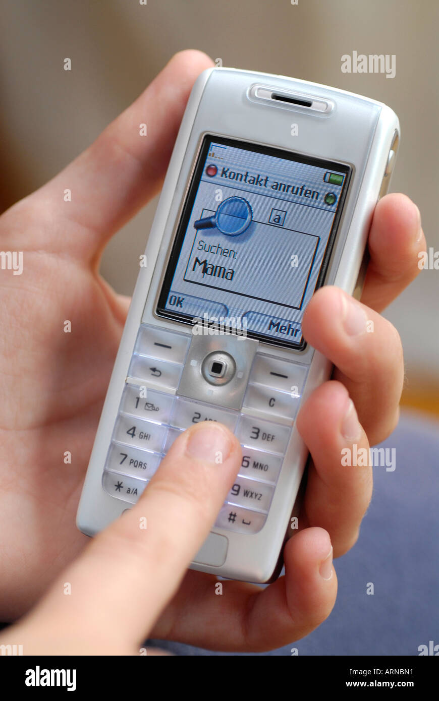 Telephones with mobile phone Stock Photo - Alamy