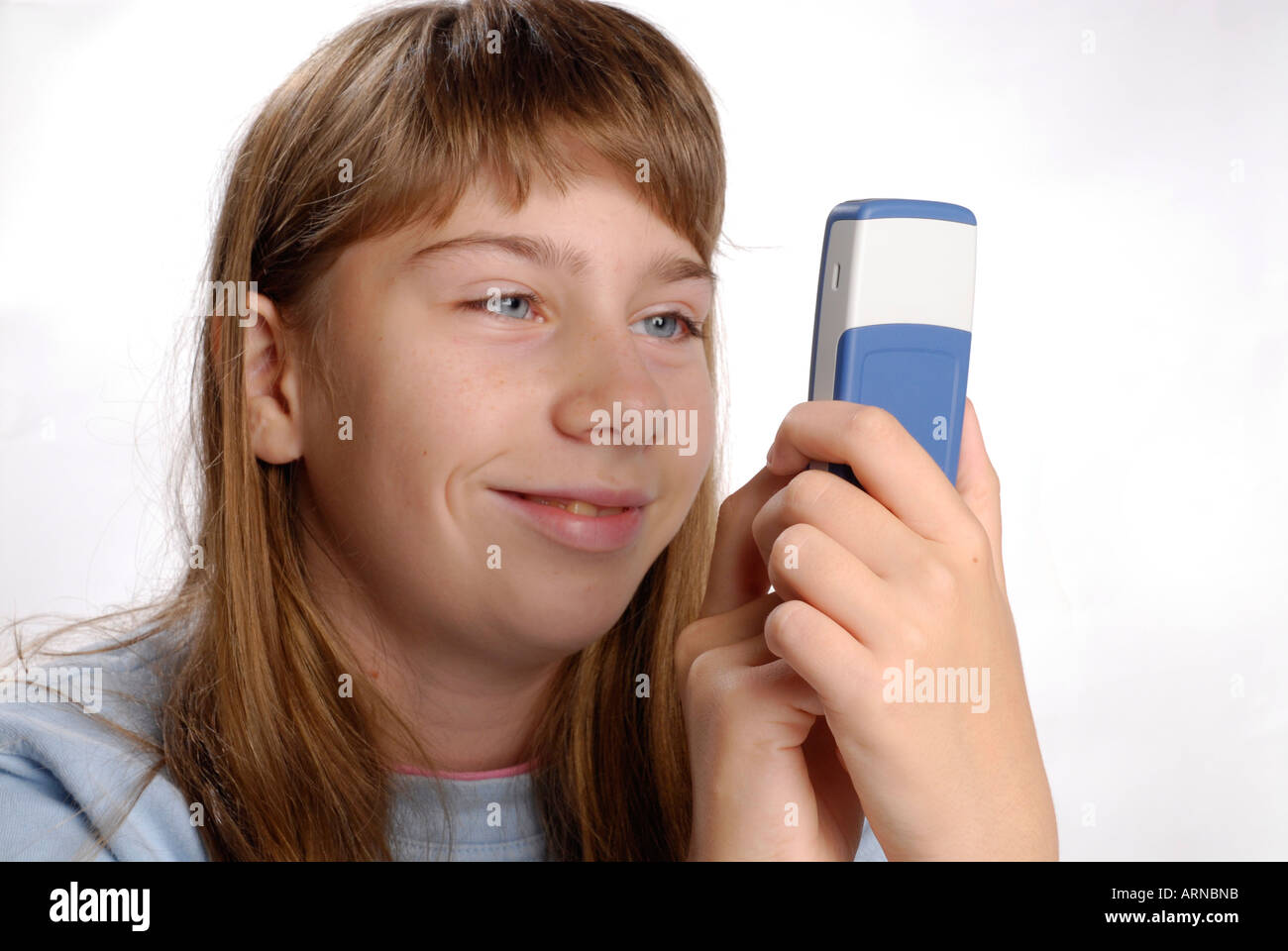 Girl telephones with mobile phone Stock Photo - Alamy