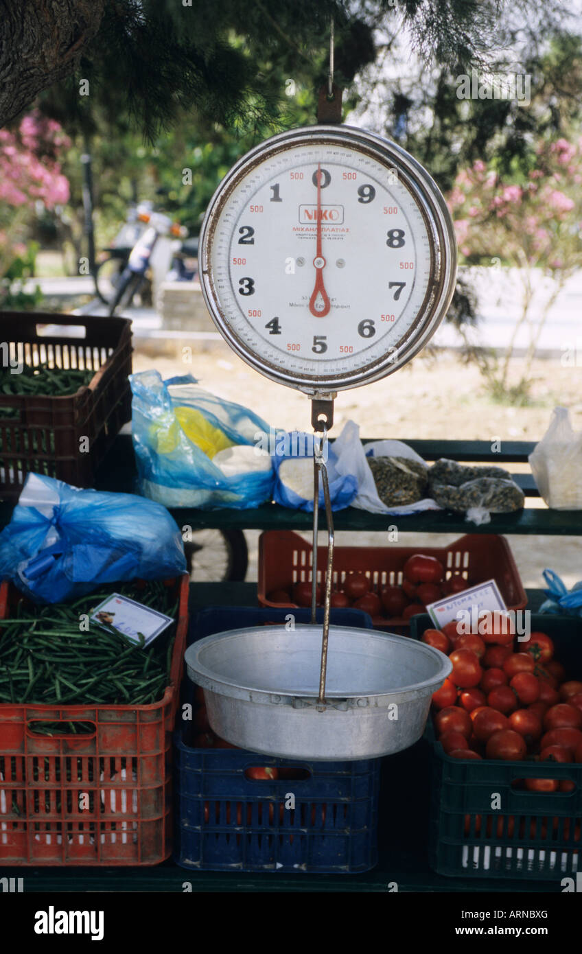 Traditional weighing scales for groceries are still in use in the small ...