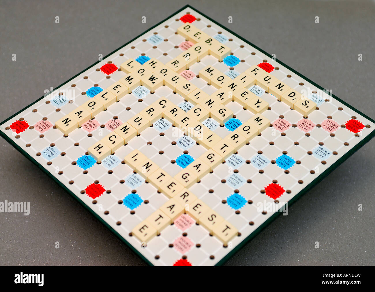generic scrabble board with credit crunch wording Stock Photo - Alamy