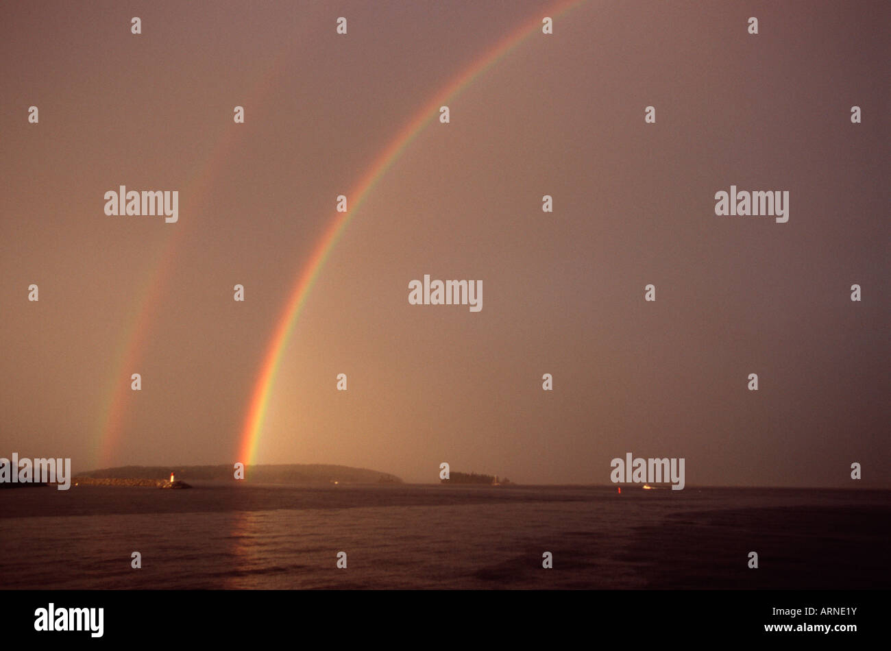 Double rainbows over the ocean hi-res stock photography and images - Alamy