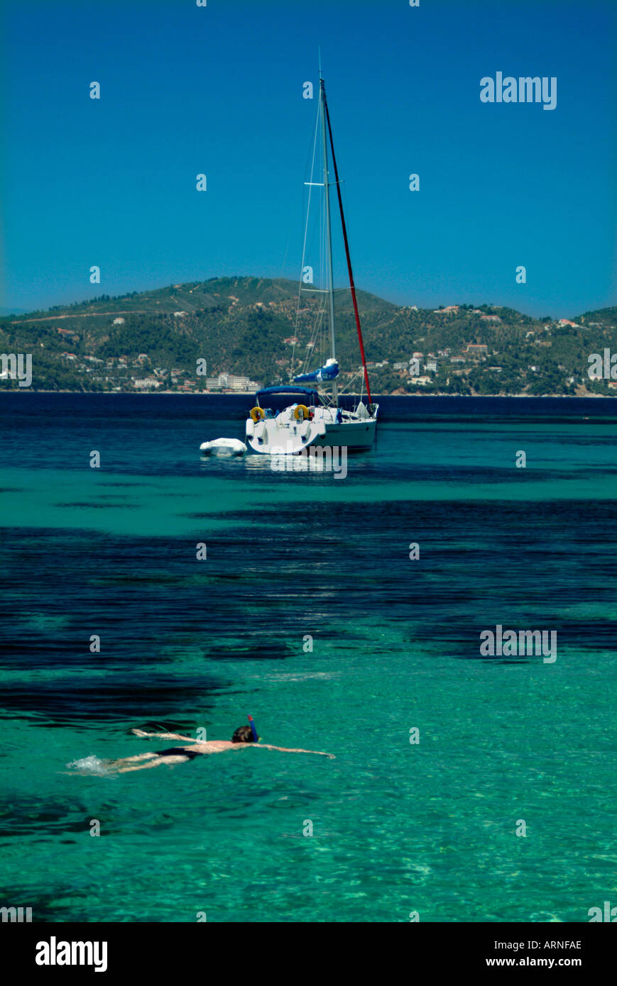 sailing boat anchored off Skiathos Greece near Argos Island Stock Photo ...
