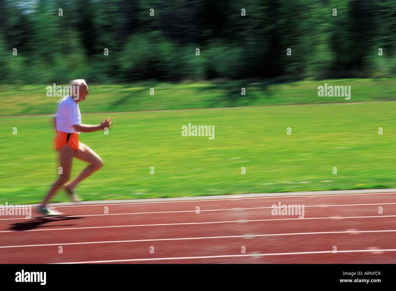 Elderly man jogs on a track, British Columbia, Canada Stock Photo - Alamy