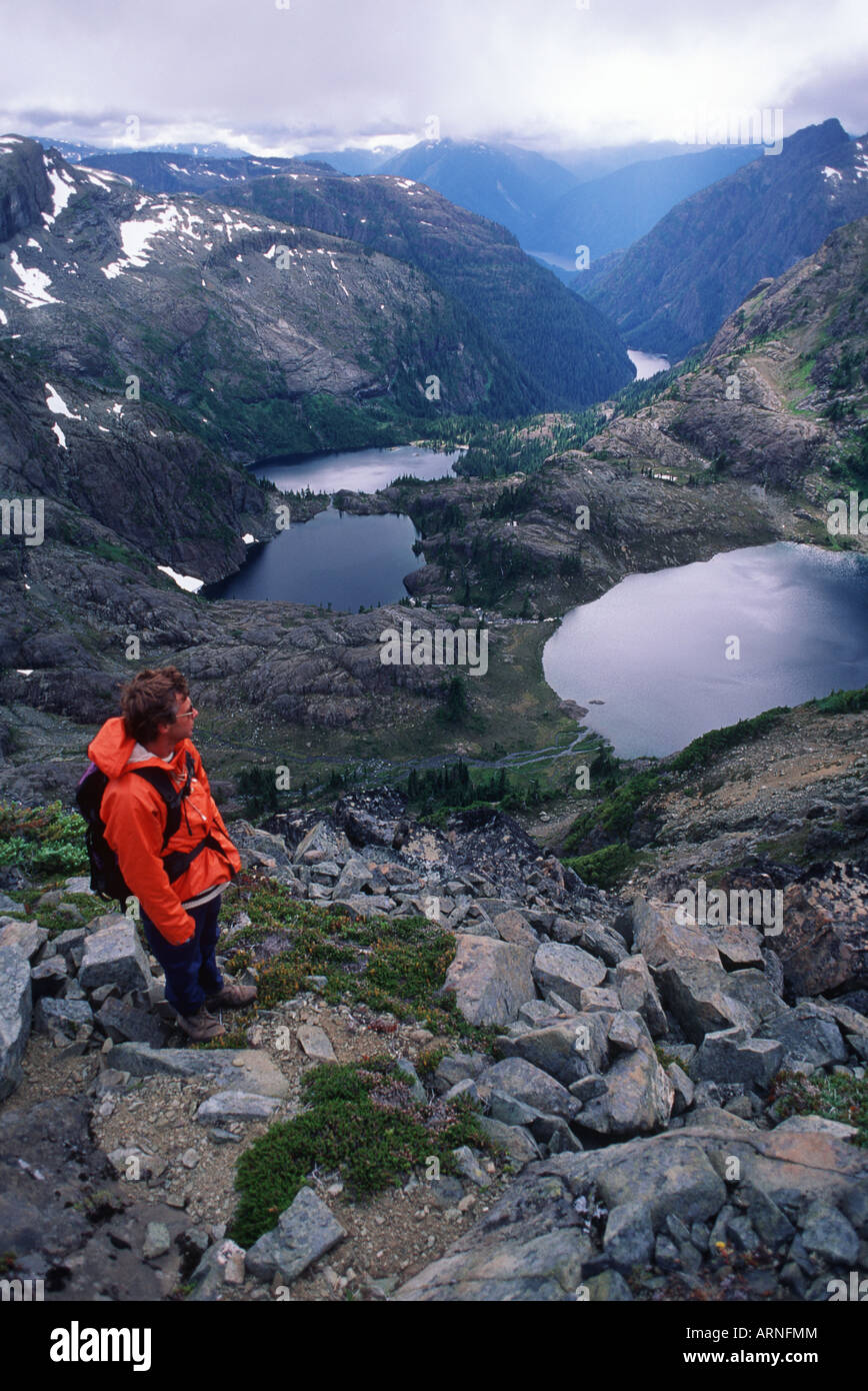 Strathcona Provincial Park, hiker on Mt Albert Edward descent above ...
