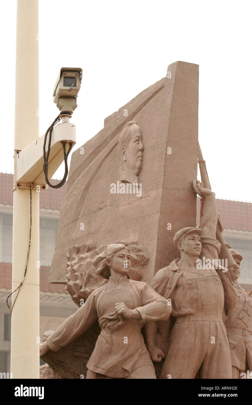 Surveillance camera and statue of heroic soldiers and workers by the ...