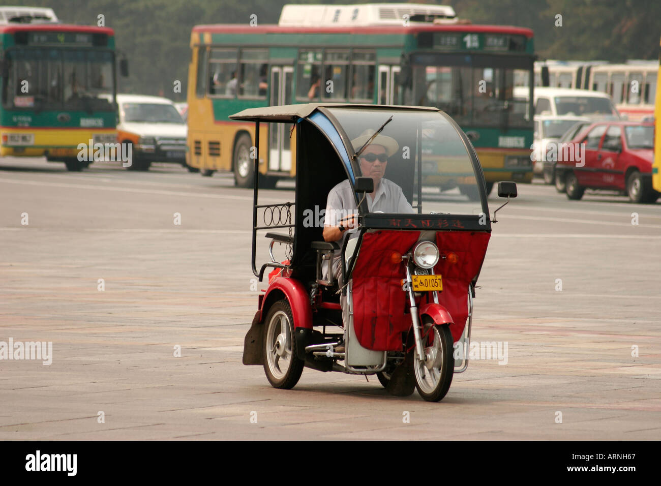 Taxi tricycle in the street in Beijing China Stock Photo - Alamy
