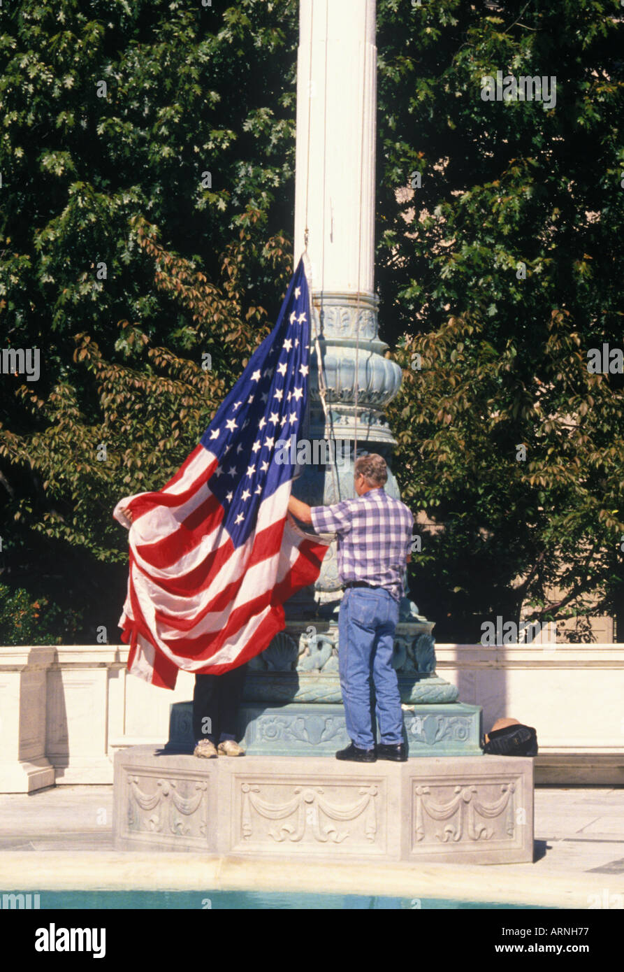 Taking down flag hi-res stock photography and images - Alamy