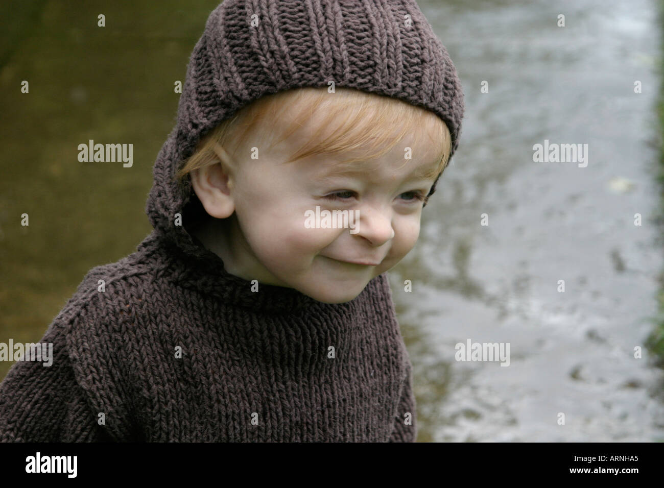 Toddler enjoying rain and wind blowing in his face Stock Photo - Alamy
