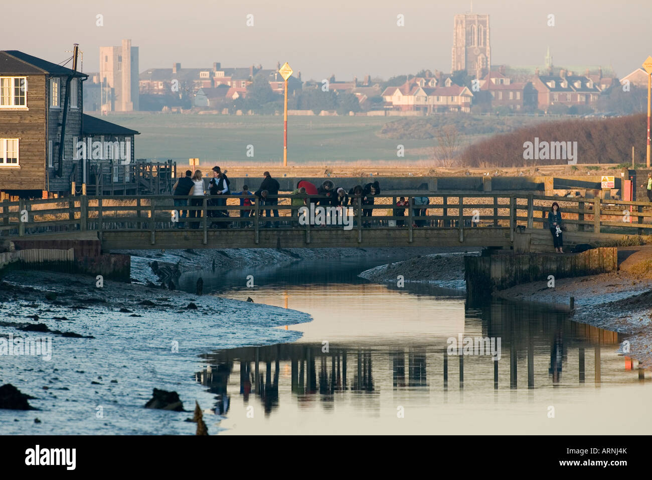 People crab fishing on the river Blyth at Walberswick in Suffolk Stock ...