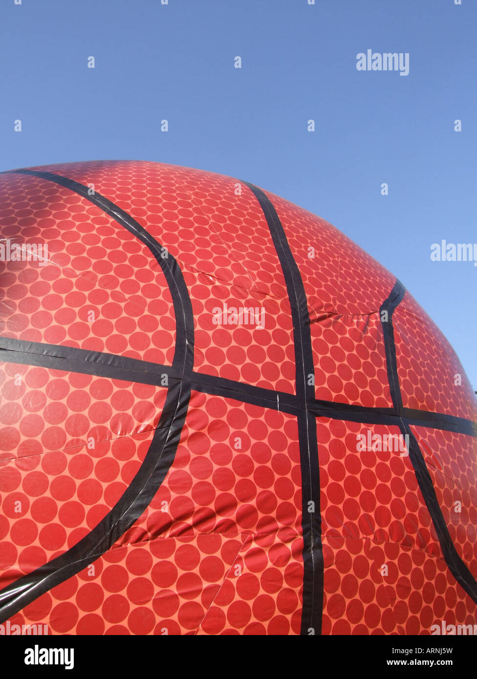 inflatable basketball at event Stock Photo - Alamy