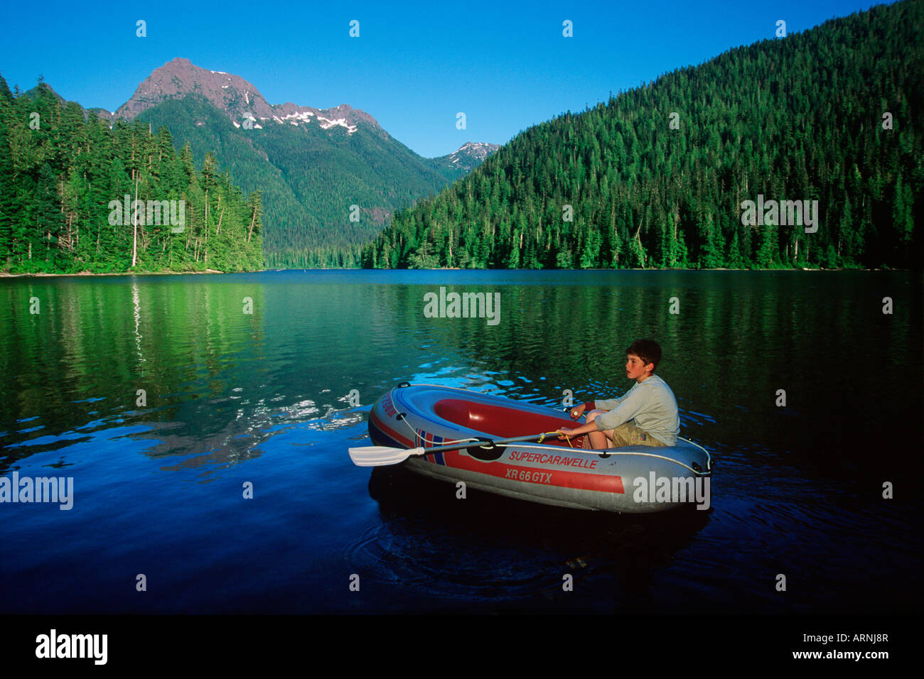 Child paddling in canada hi-res stock photography and images - Alamy
