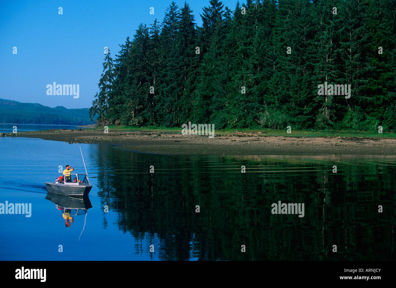 Shore scene with boat and boater hi-res stock photography and images ...