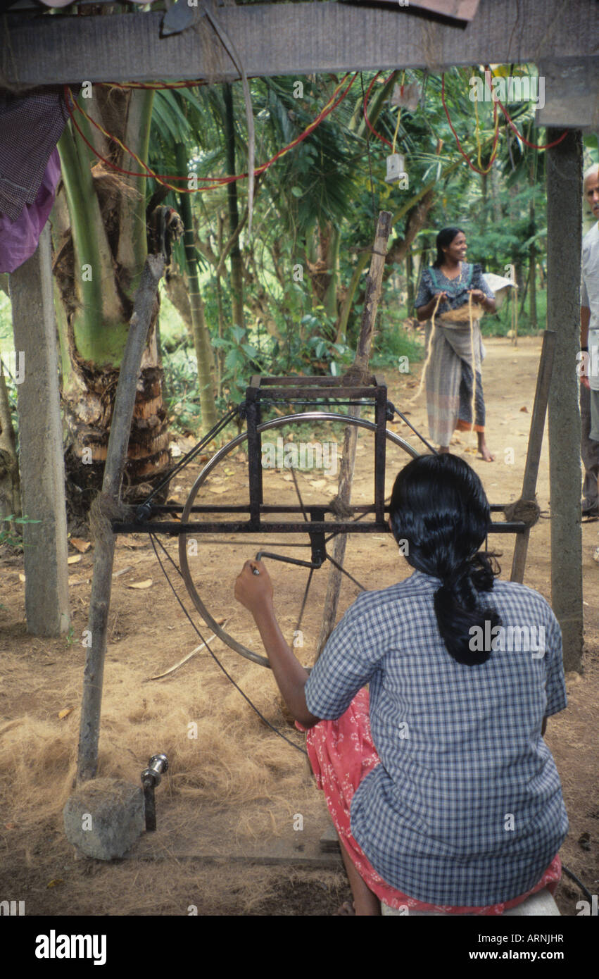 Spinning rope from coconut husk coir, Keralan village near Cochin ...