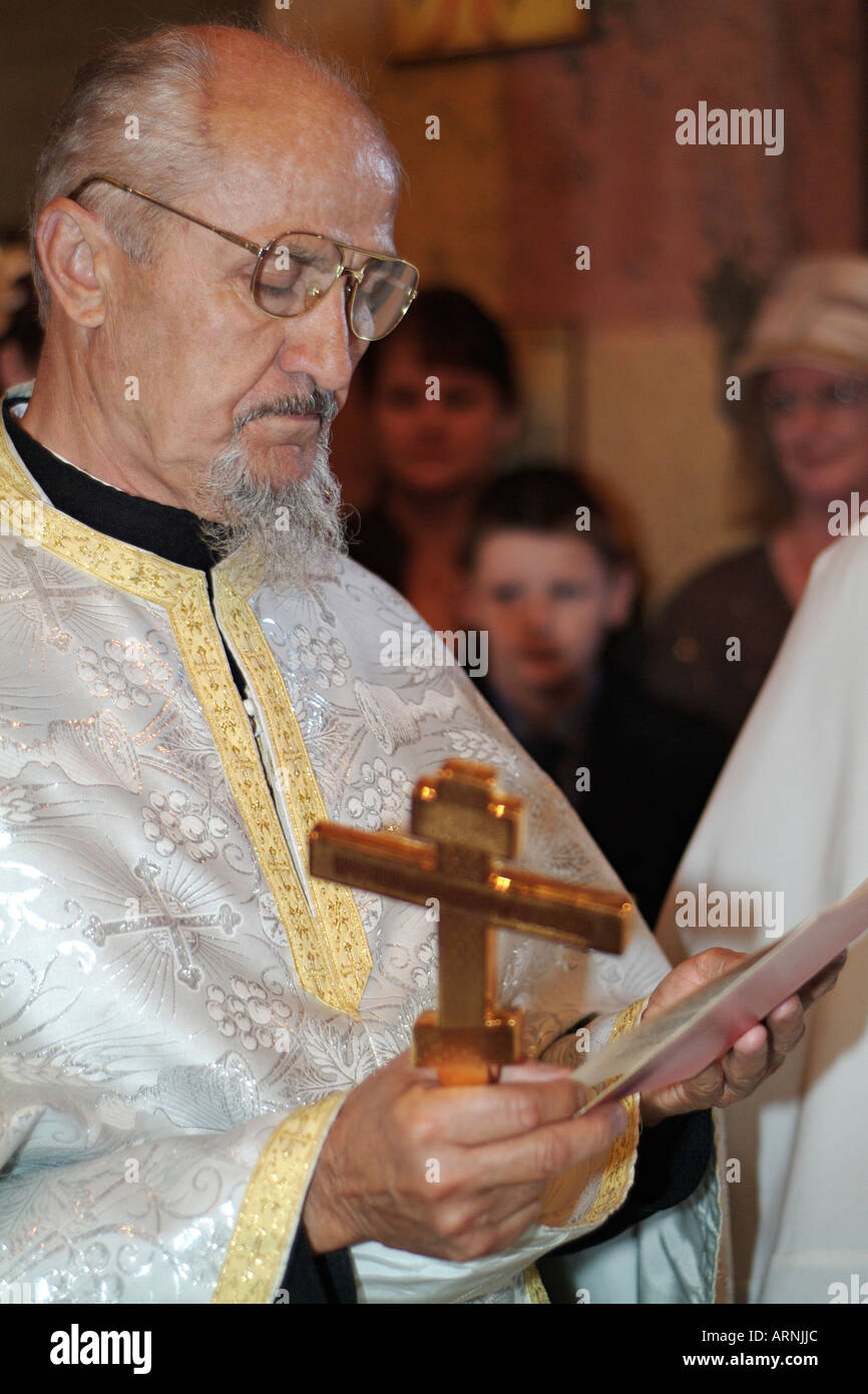 Orthodox Priest Taking a Reading as Part of an Eastern Orthodox Wedding ...