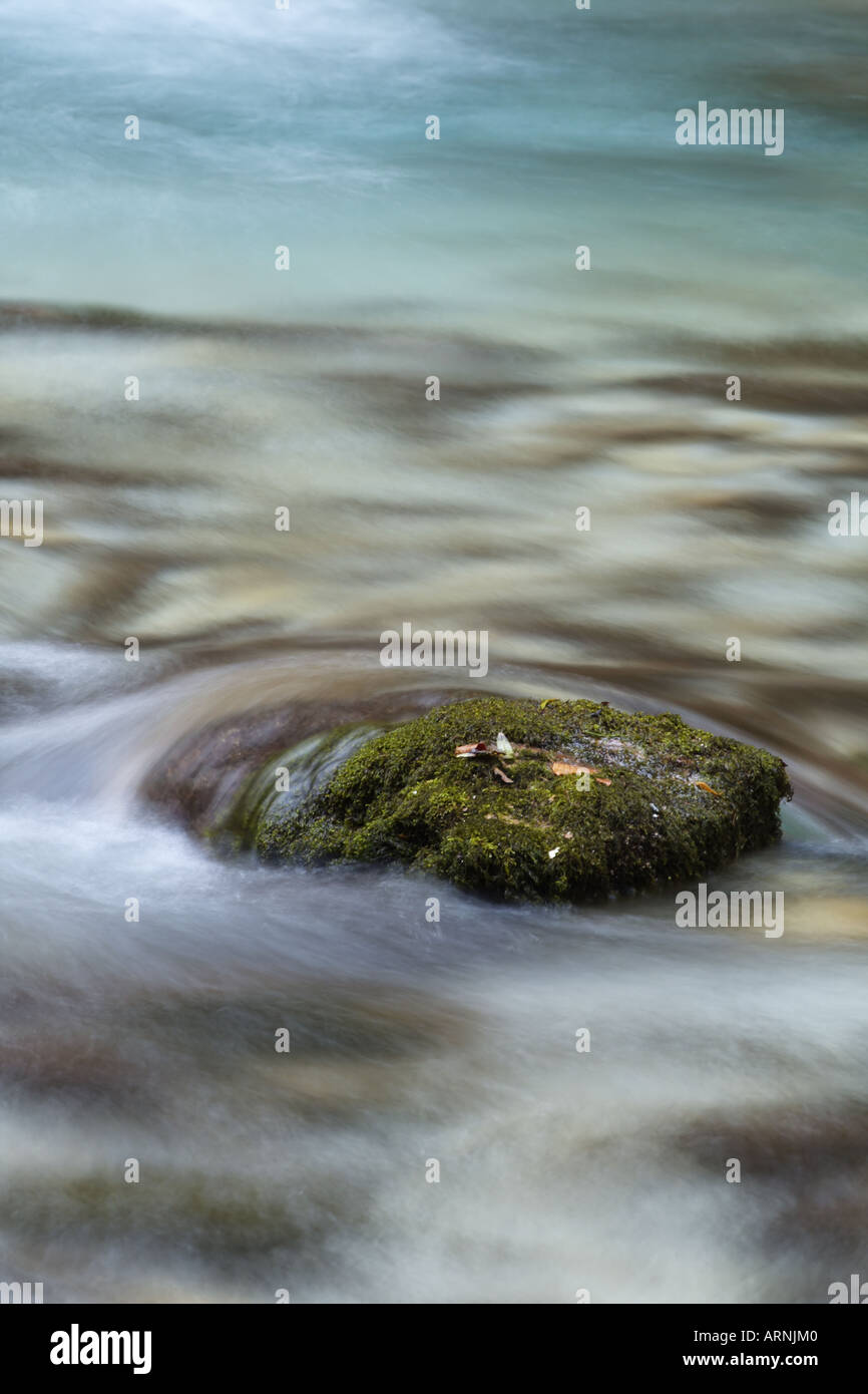 Water running over a rock Stock Photo - Alamy