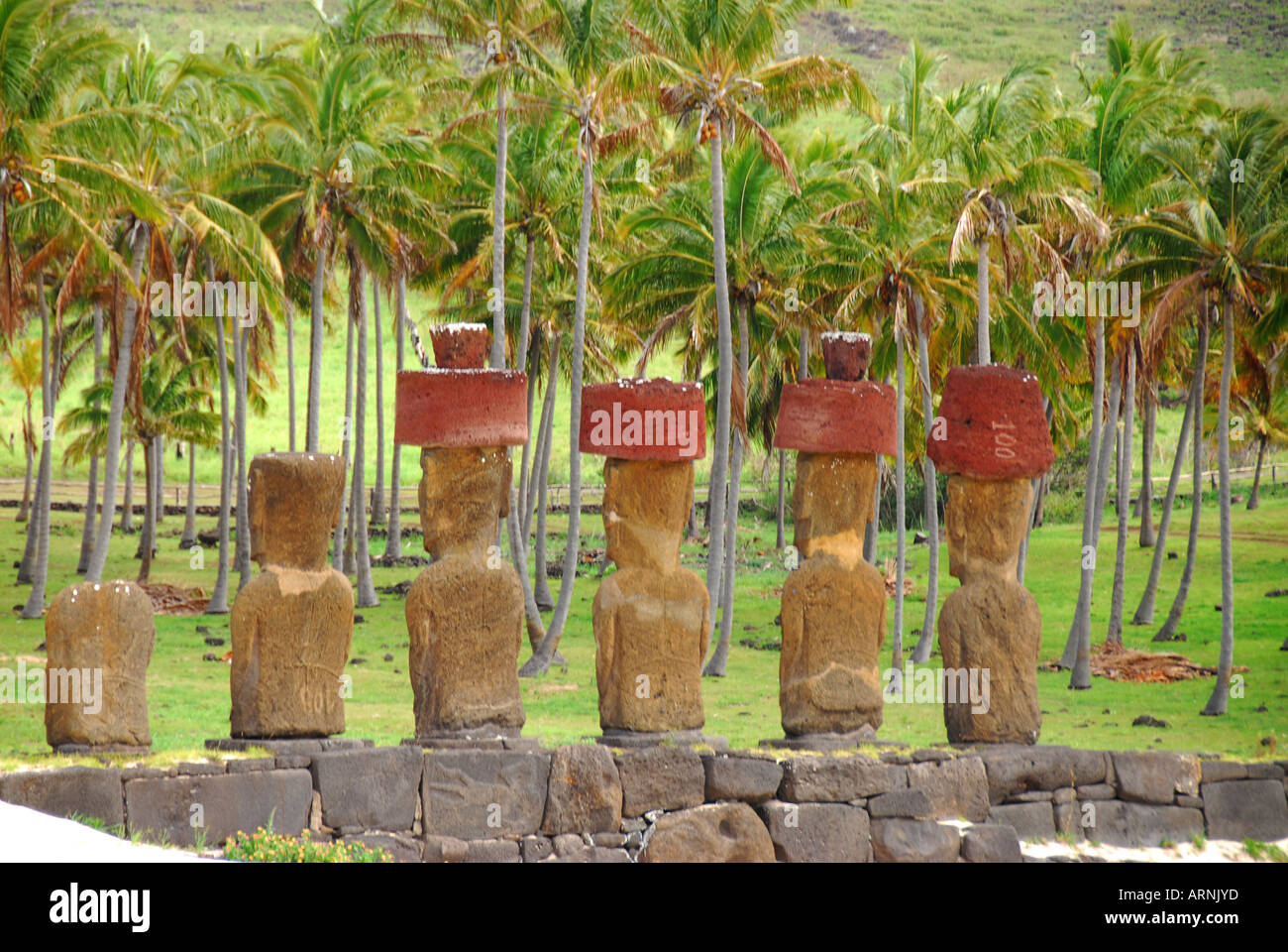 Chile Easter Island moai with red topknot hats at Anakena Ahu Nau Nau ...