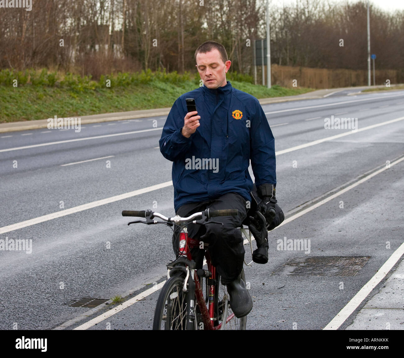 Cyclist riding on pavement hi-res stock photography and images - Alamy