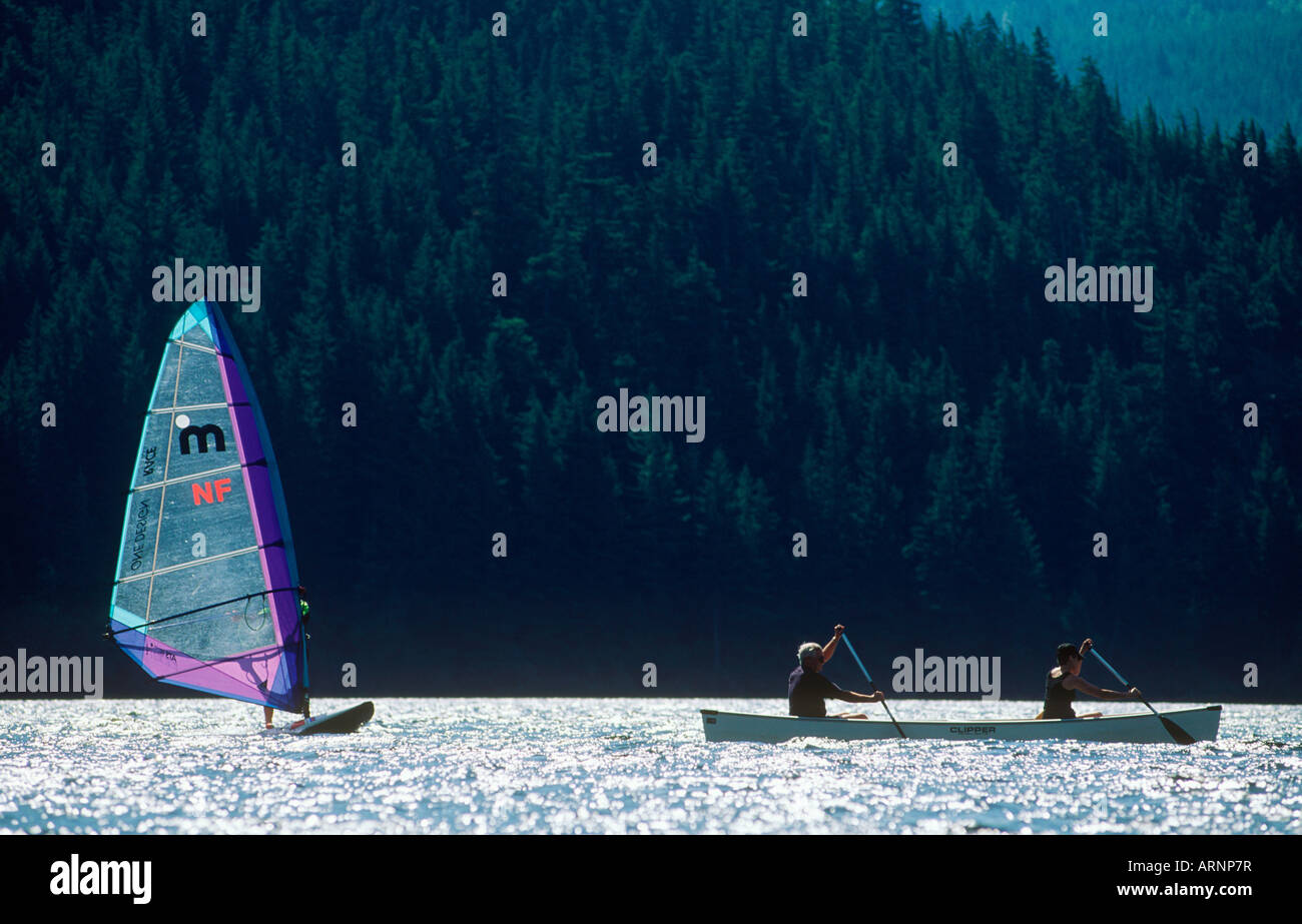 Sailboarder and canoe on alta lake hi-res stock photography and images ...