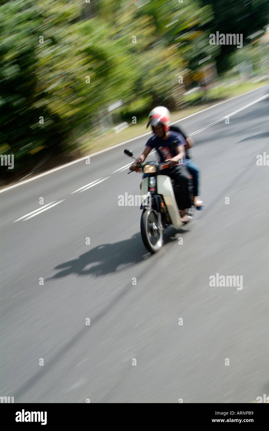 scooter, moped, traveling, at speed, in penang, malayasia, asia, asian ...
