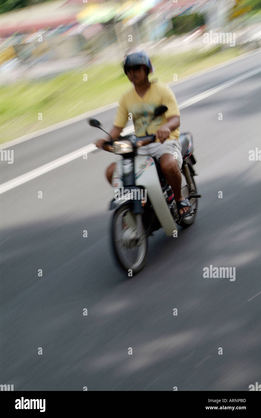 scooter, moped, traveling, at speed, in penang, malayasia, asia, asian ...