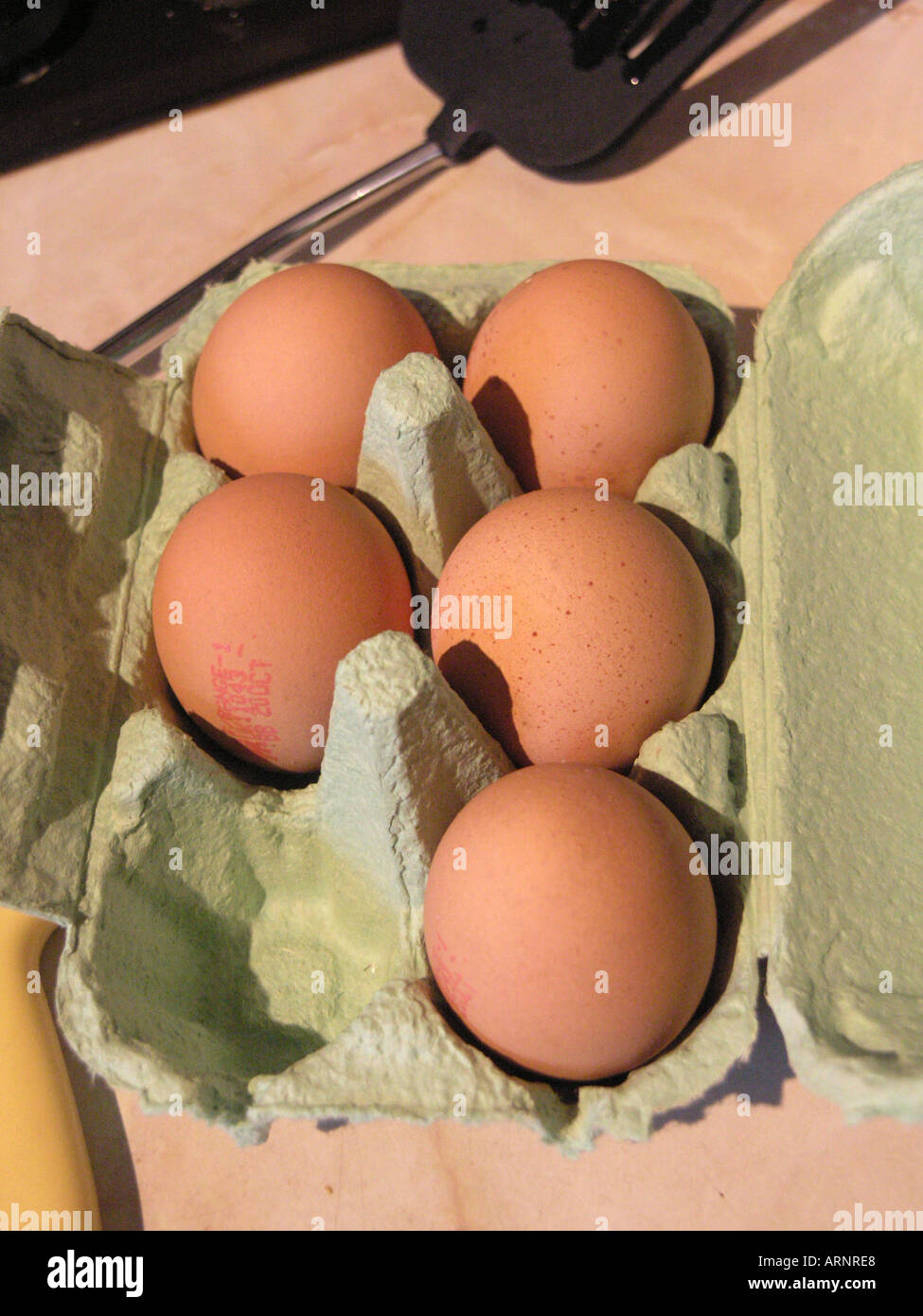 Eggs in an egg box Stock Photo - Alamy