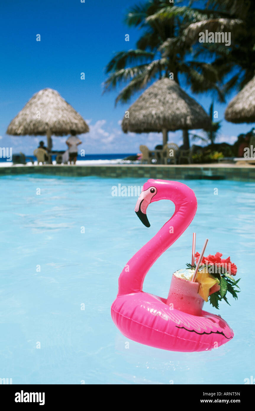 Cook Islands, South Pacific, Raratonga, tropical drink in pink flamingo ...