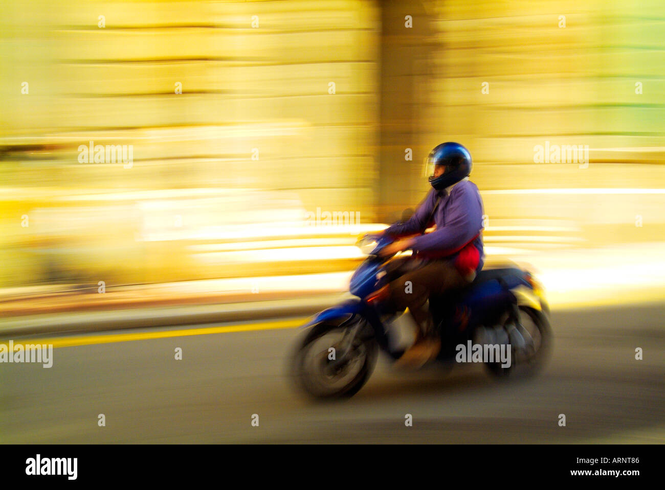 Moped speeding in street hi-res stock photography and images - Alamy