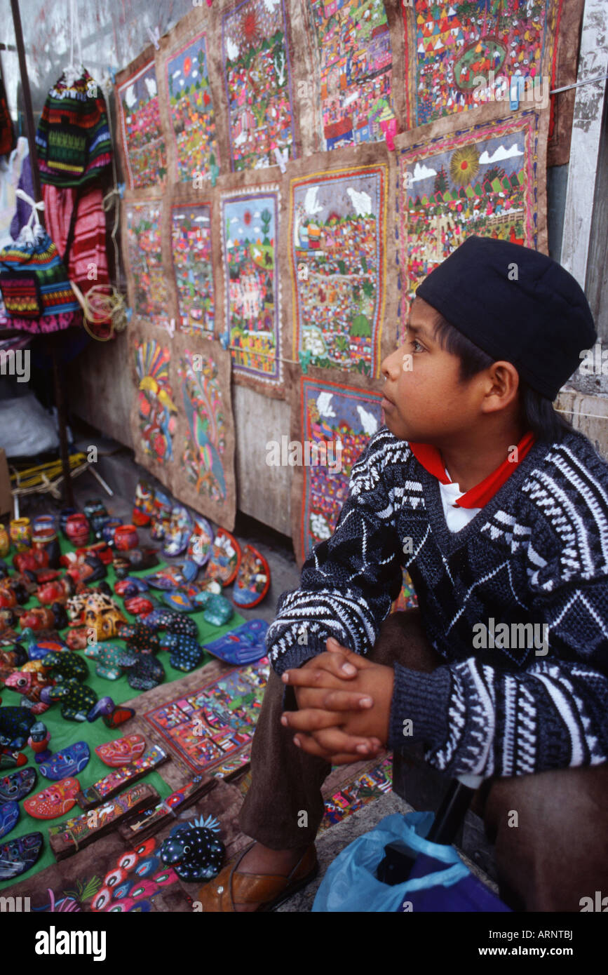 Mexico City, boy selling wares on street side market stand Stock Photo ...