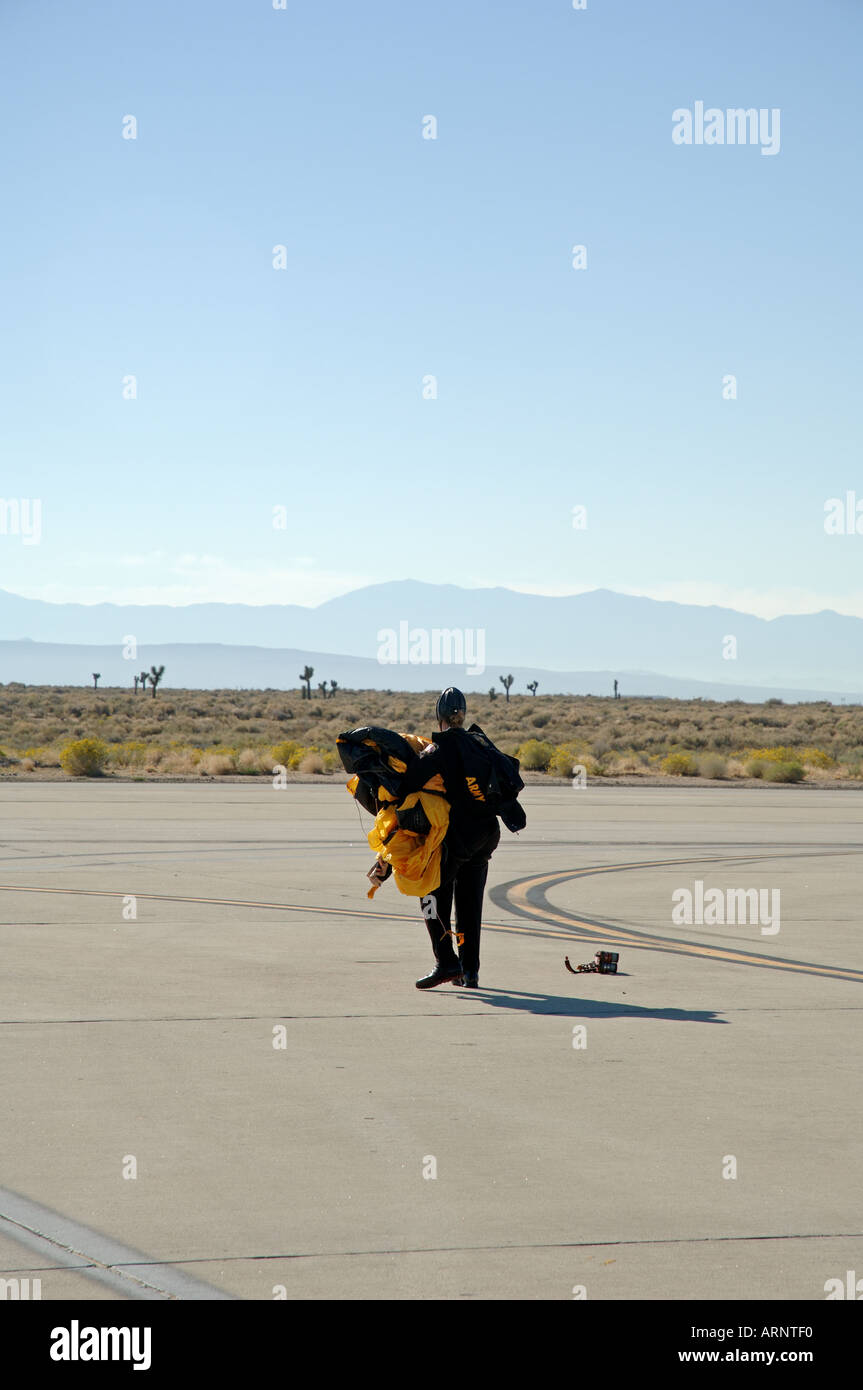 United States ARMY Parachute Team member landing on runway at Edwards ...