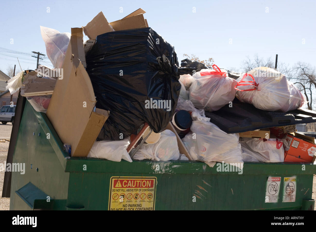 pile of garbage in dumpster, trash can outdoor Stock Photo - Alamy