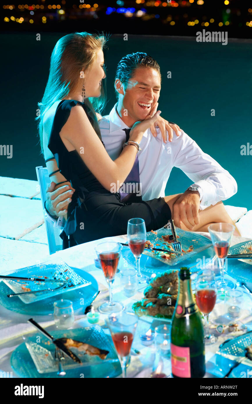 Man and woman at a party Stock Photo - Alamy