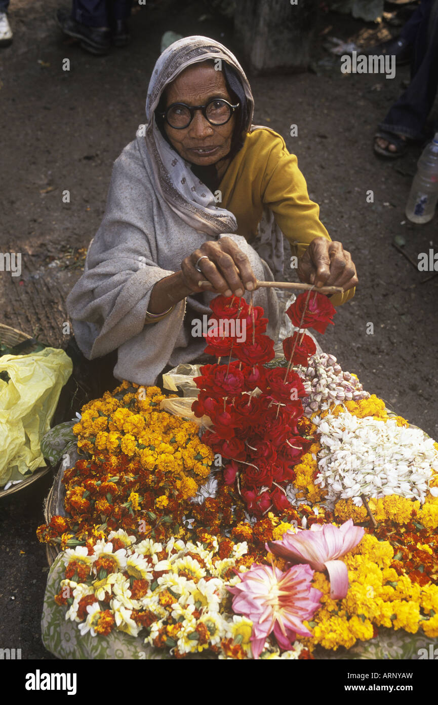 India, Varanasi, women selling flowers Stock Photo - Alamy