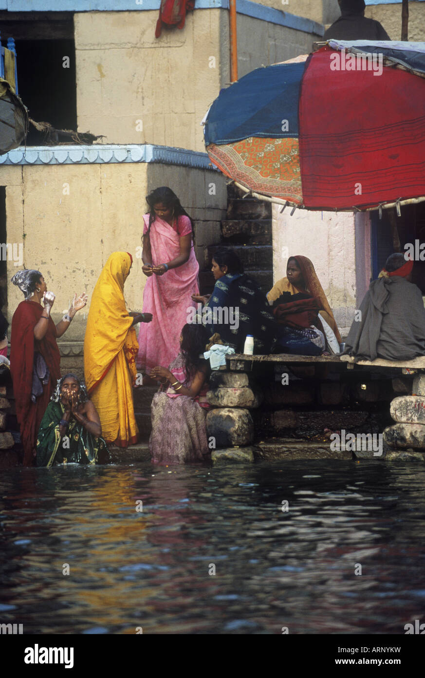 India, Varanasi, Ganges Ghats, religious pilgrims, bathing in river ...