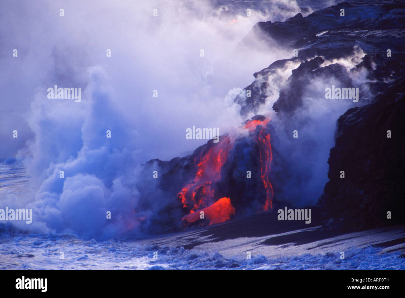 USA, Hawaii, (Big Island) Kilauea Volcano - Lava Tubes flowing into sea ...