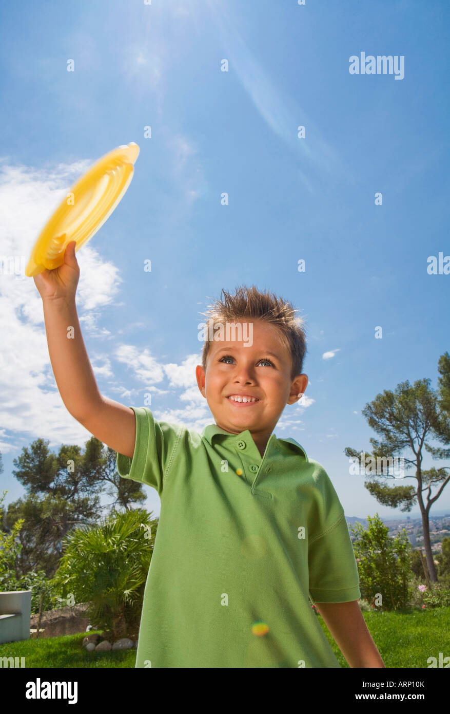 Boy holding Frisbee Stock Photo - Alamy