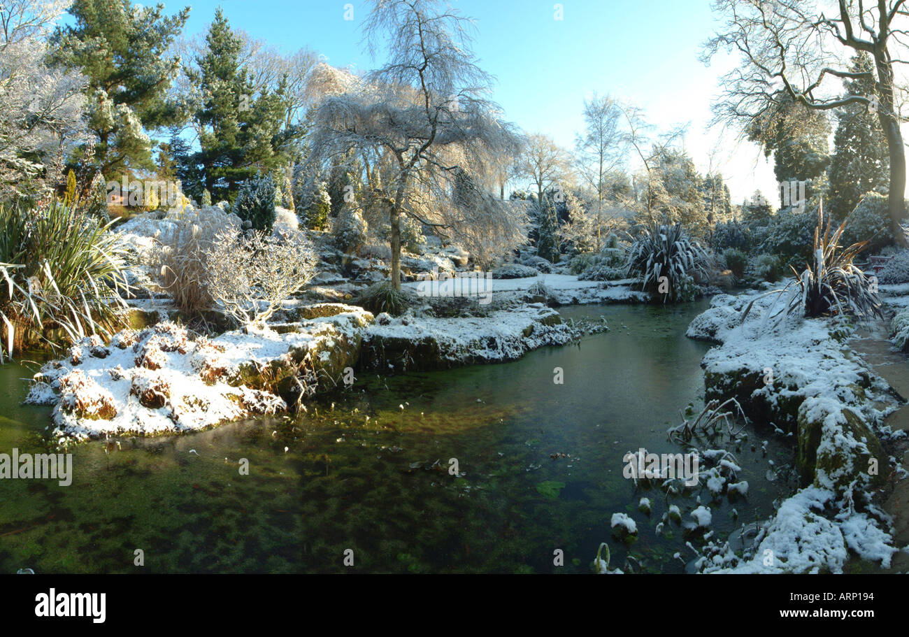 Fletcher moss lake pond in snow arboretum Didsbury Park Manchester ...