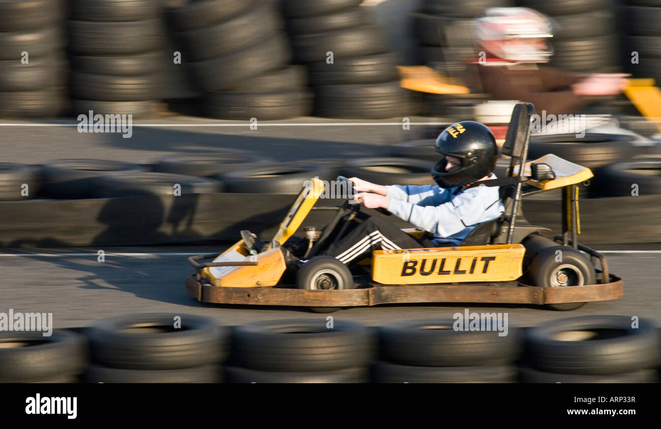 Boy racer driving racing [go cart] Stock Photo - Alamy