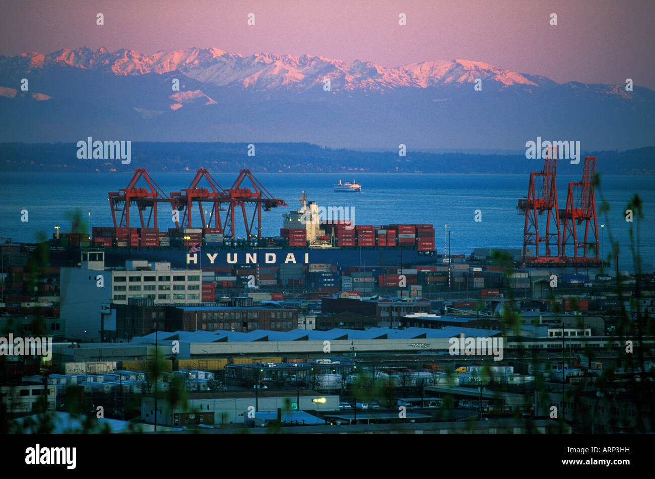 USA, Washington State, Seattle, Port facility with Olympic Mountains ...