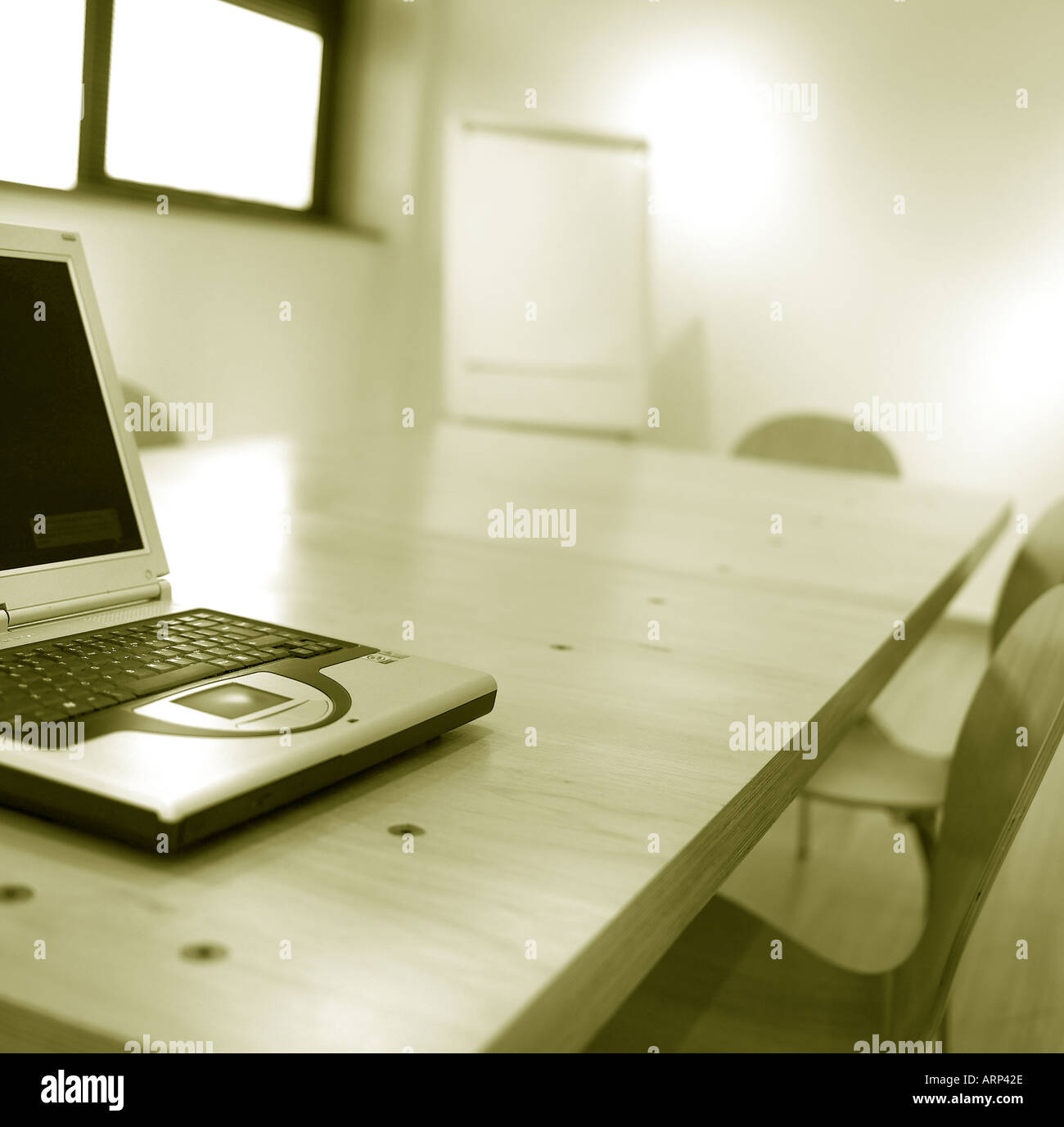Laptop computer on office desk Stock Photo - Alamy