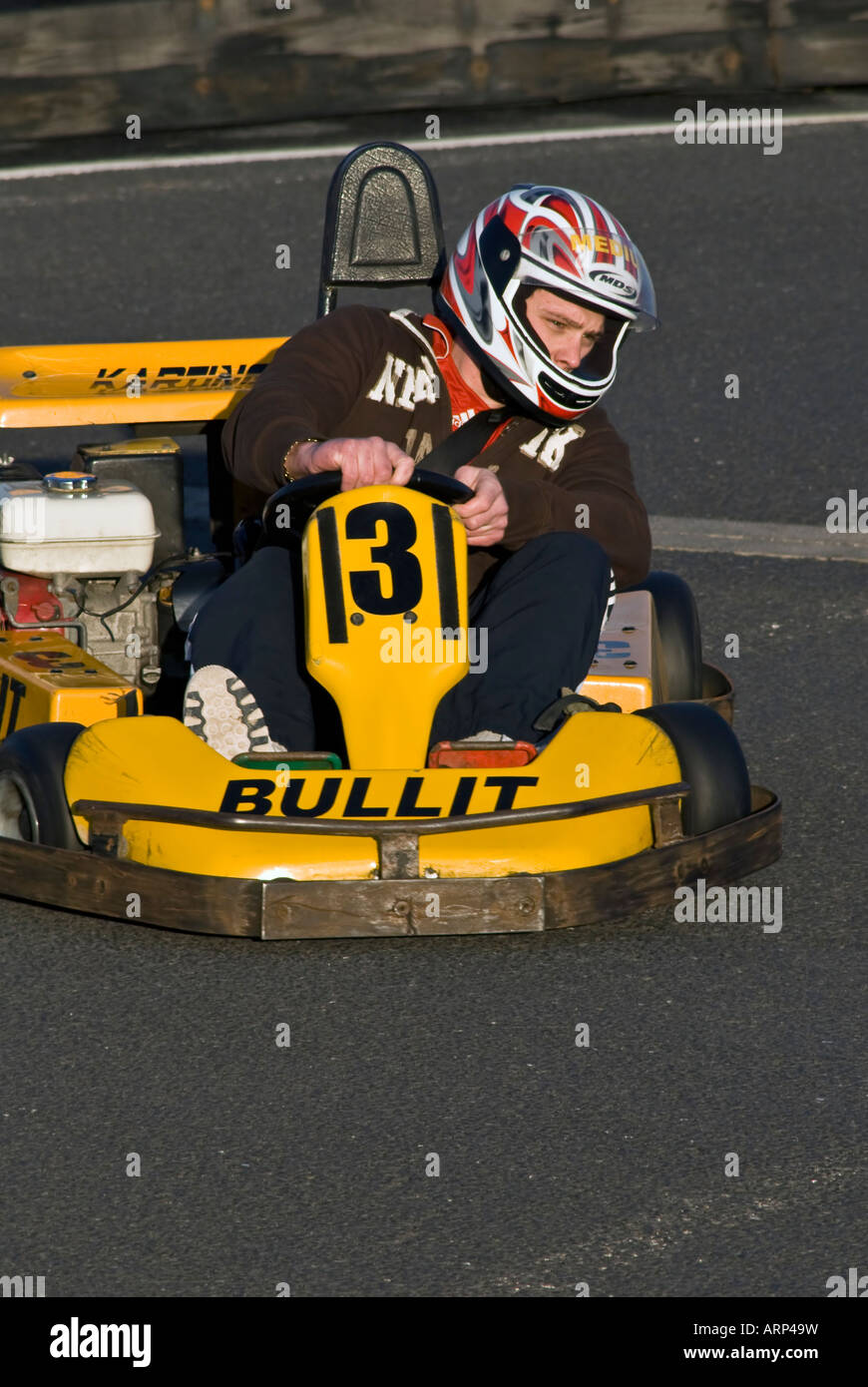 Boy racer driving racing [go cart] Stock Photo - Alamy