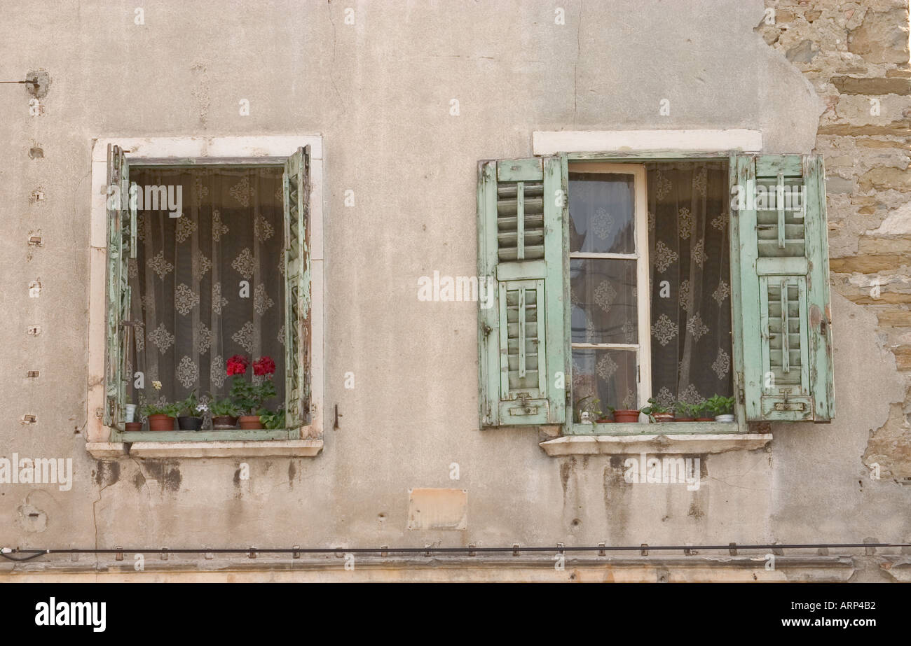 windows with open and closed shutters Stock Photo - Alamy