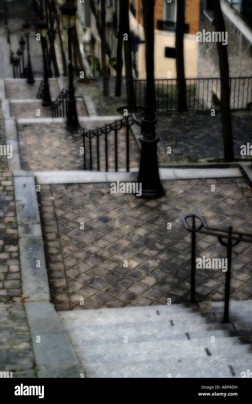 Steps leading down from the Basilica of Sacre Coeur into Montmartre ...